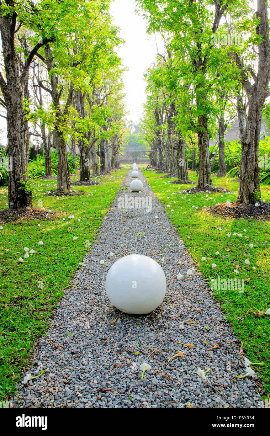 Pathway of the Garden with Circular Stone Stock Photo - Alamy