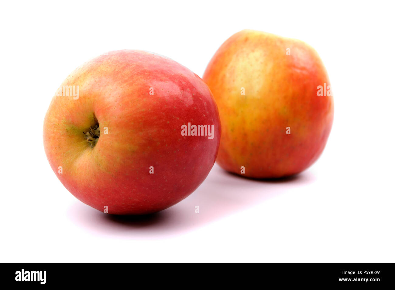 Two apples together Cut Out Stock Images & Pictures - Alamy