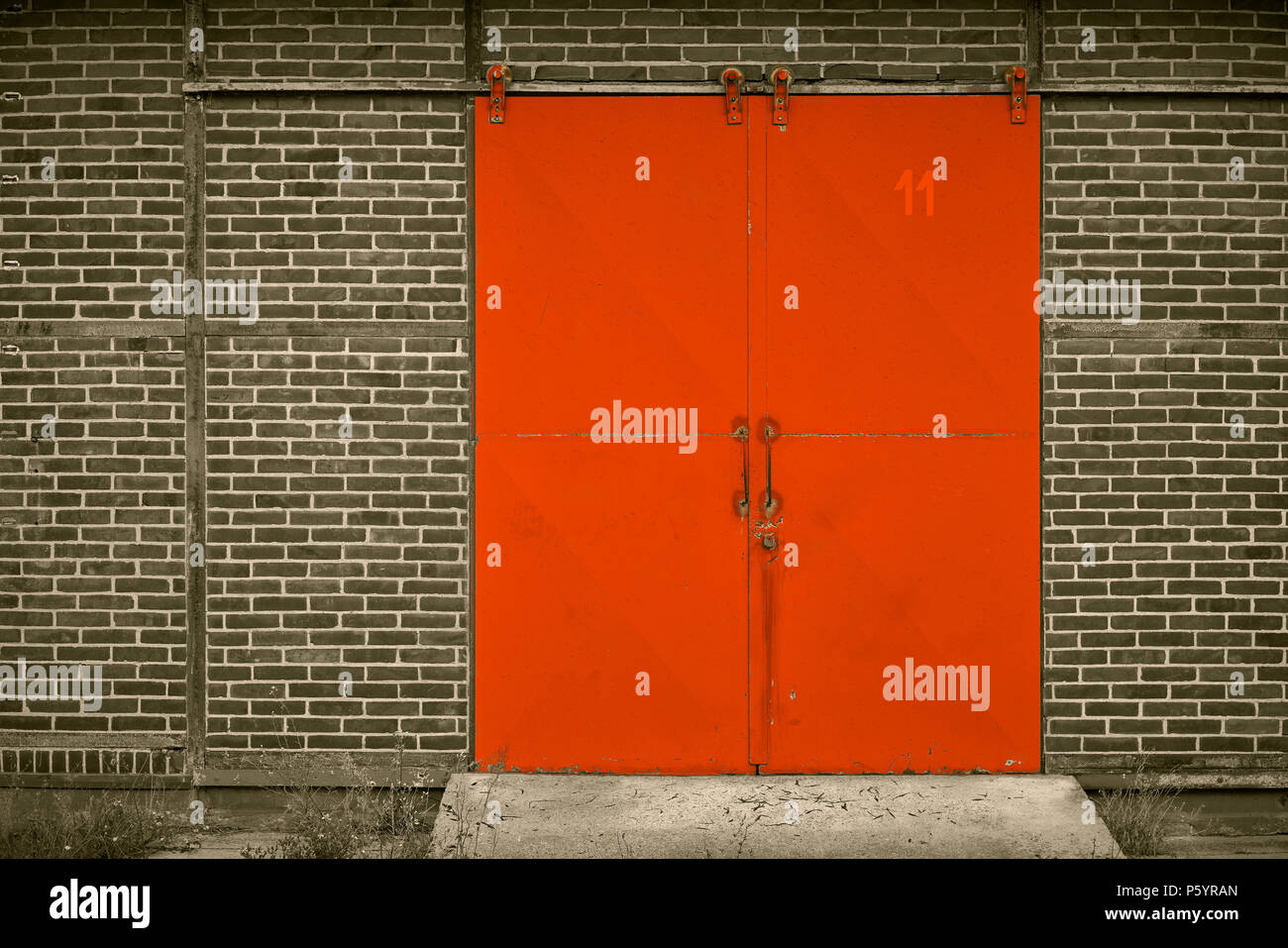 Steel door at a factory building in Magdeburg Stock Photo - Alamy