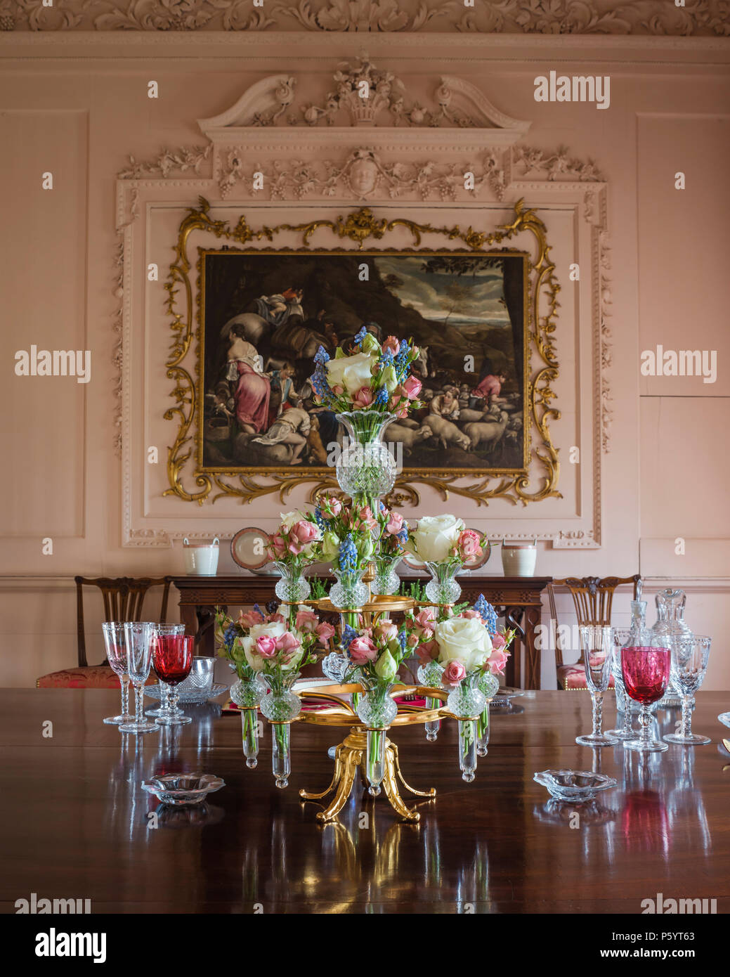Glassware and flower arrangement in luxurious dining room Stock Photo ...
