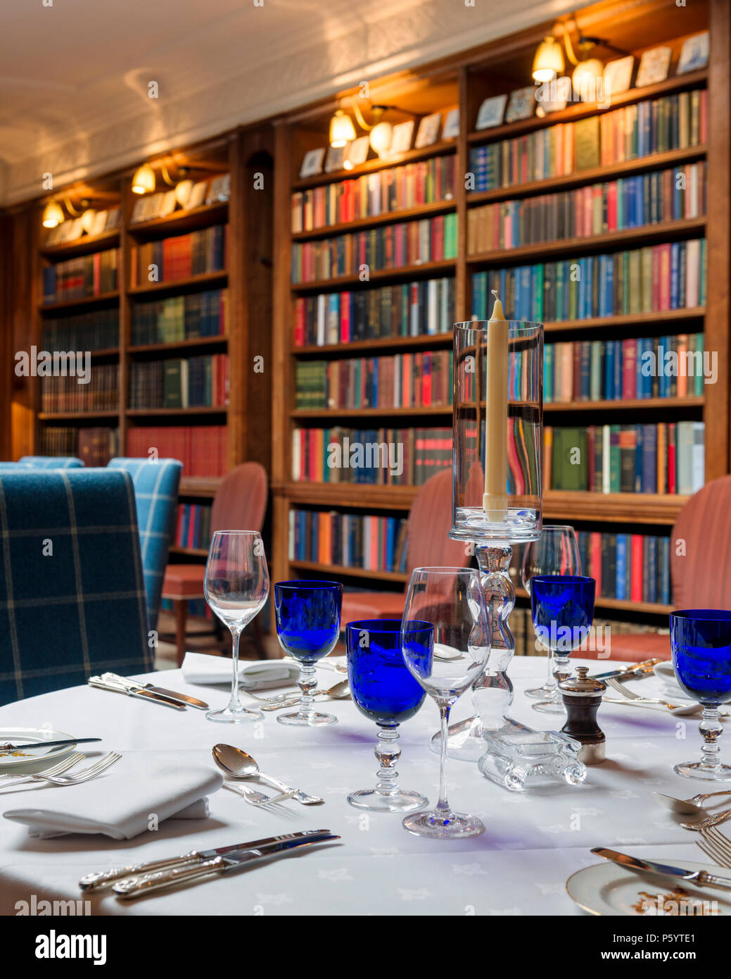 Dining room with bookcases Stock Photo - Alamy