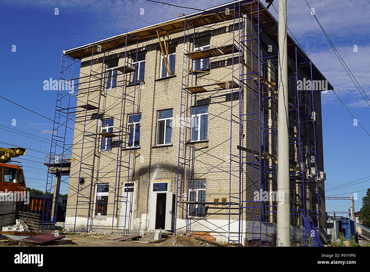 in the old building is under repair, construction work on a multi ...