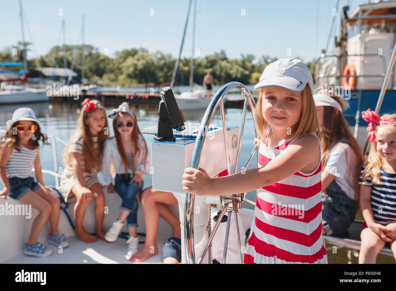 The children on board of sea yacht Stock Photo - Alamy