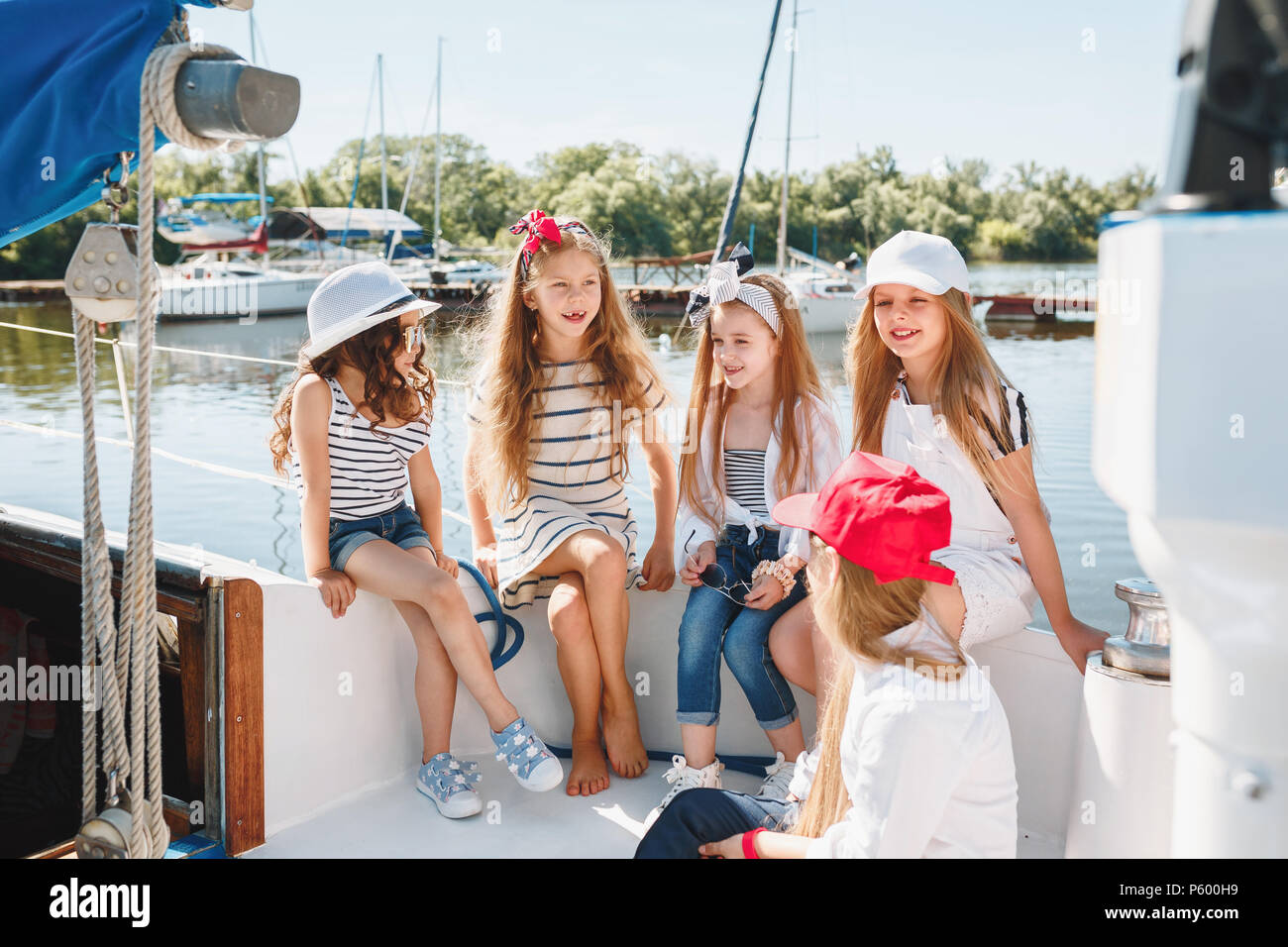 The children on board of sea yacht Stock Photo - Alamy