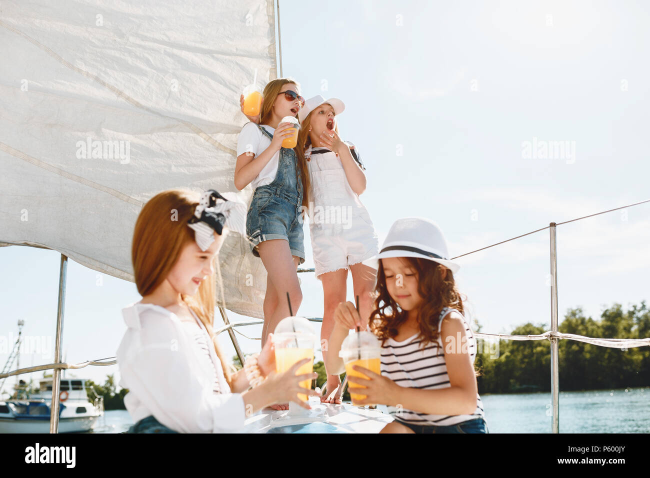 The children on board of sea yacht Stock Photo - Alamy