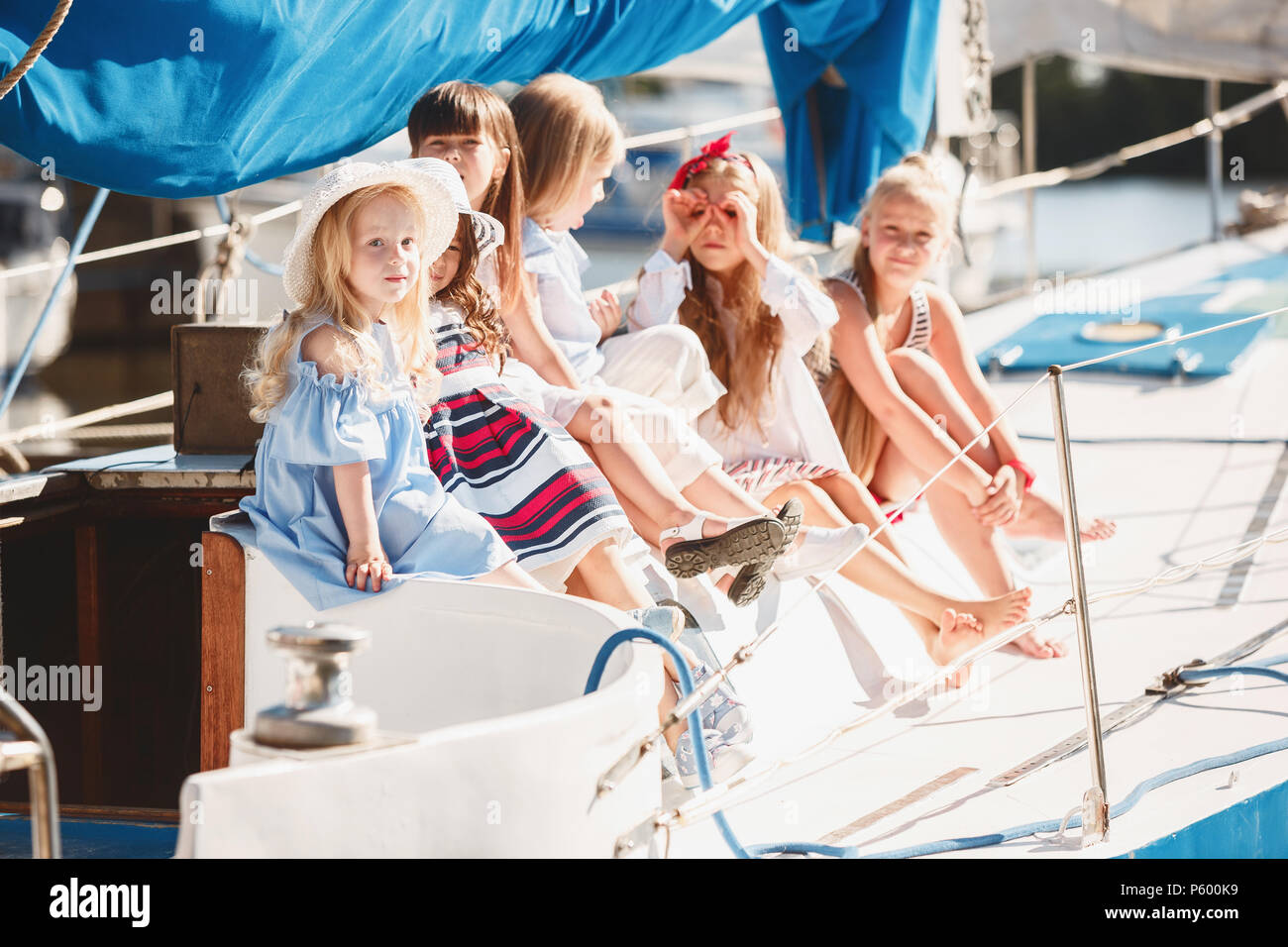The children on board of sea yacht Stock Photo - Alamy