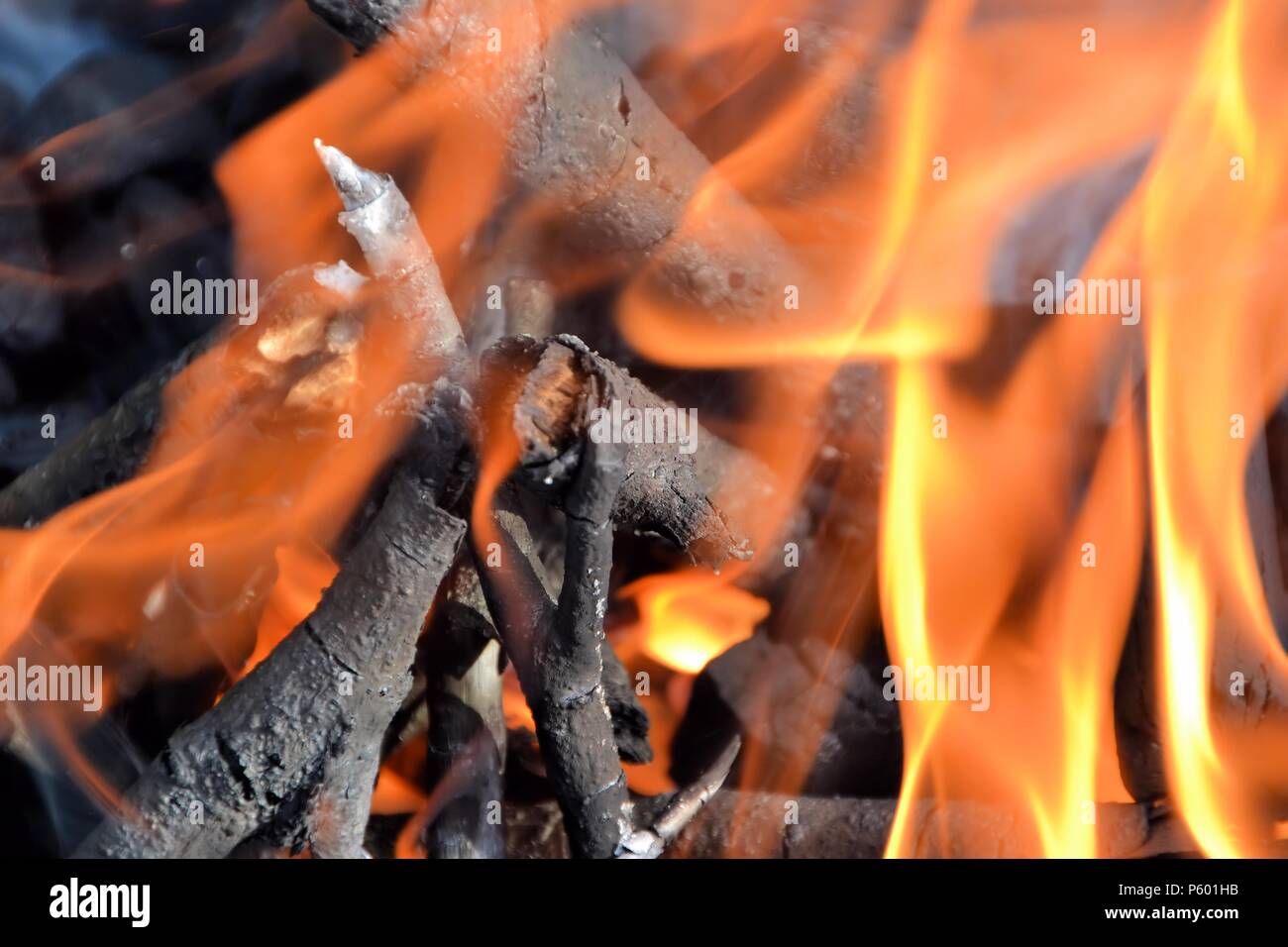 Fire at a campsite Stock Photo - Alamy