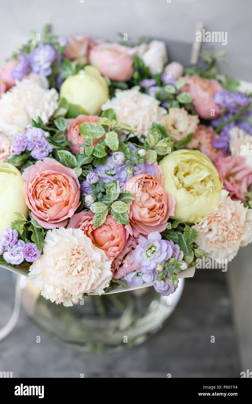Work florist. Beautiful spring bouquet. Arrangement with mix flowers ...