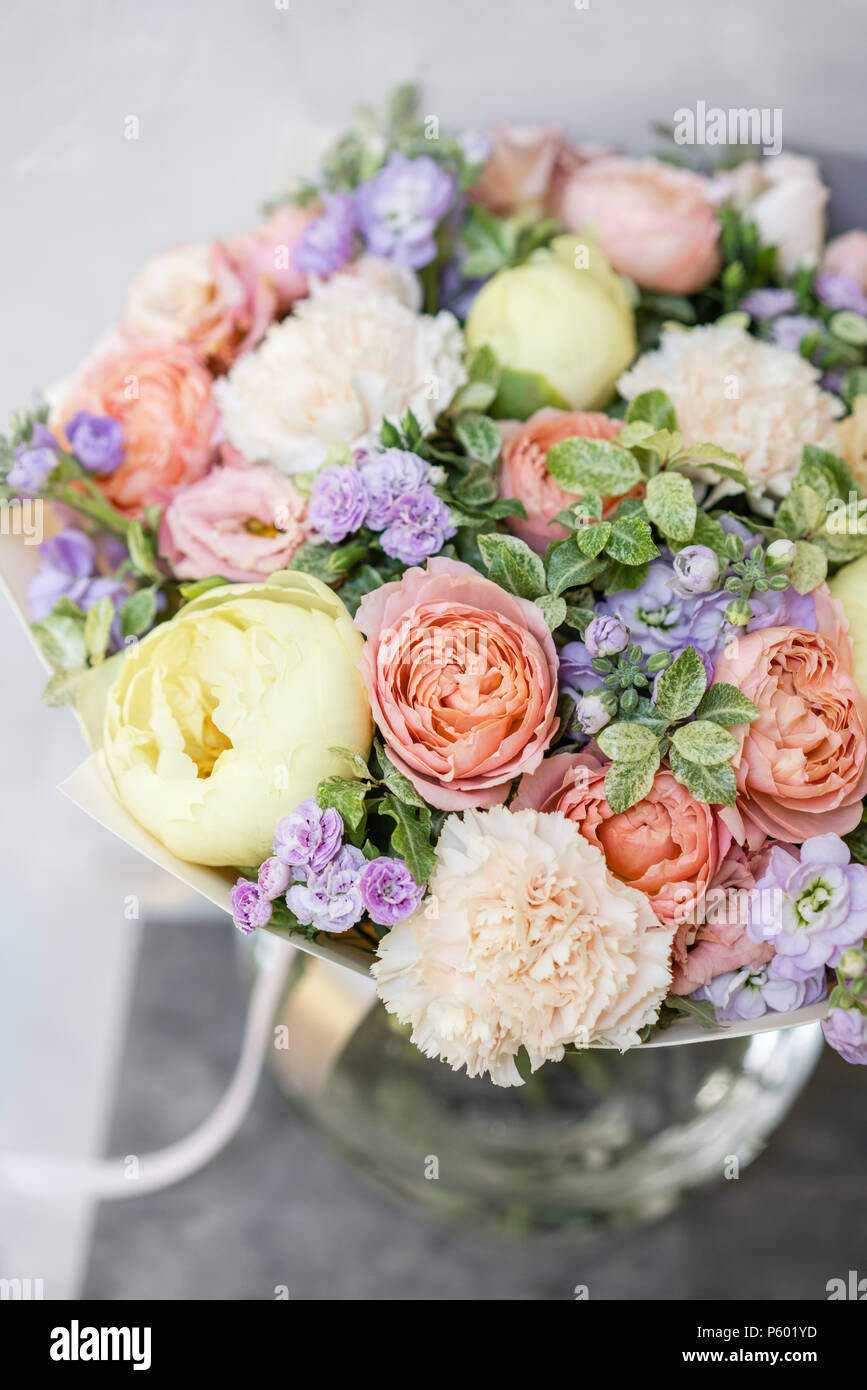 Work florist. Beautiful spring bouquet. Arrangement with mix flowers ...