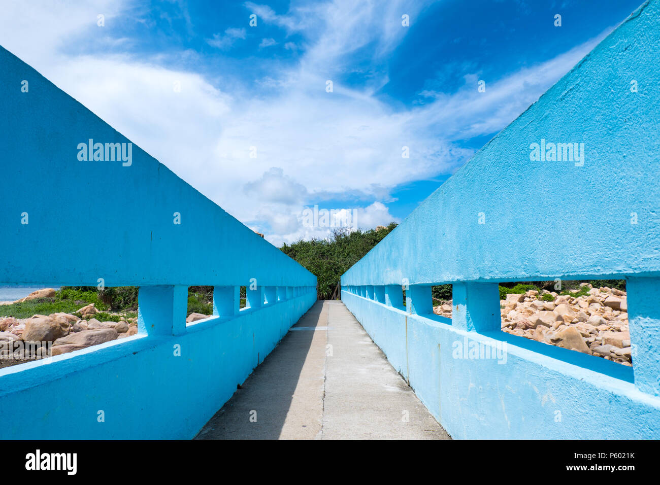 Blue bridge with blue sky and white cloud background Stock Photo - Alamy