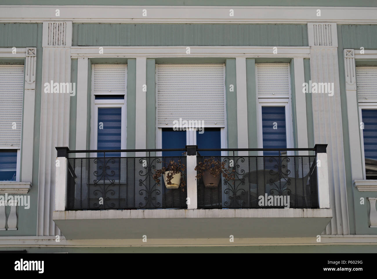 Modern building balcony with new windows and fence Stock Photo - Alamy