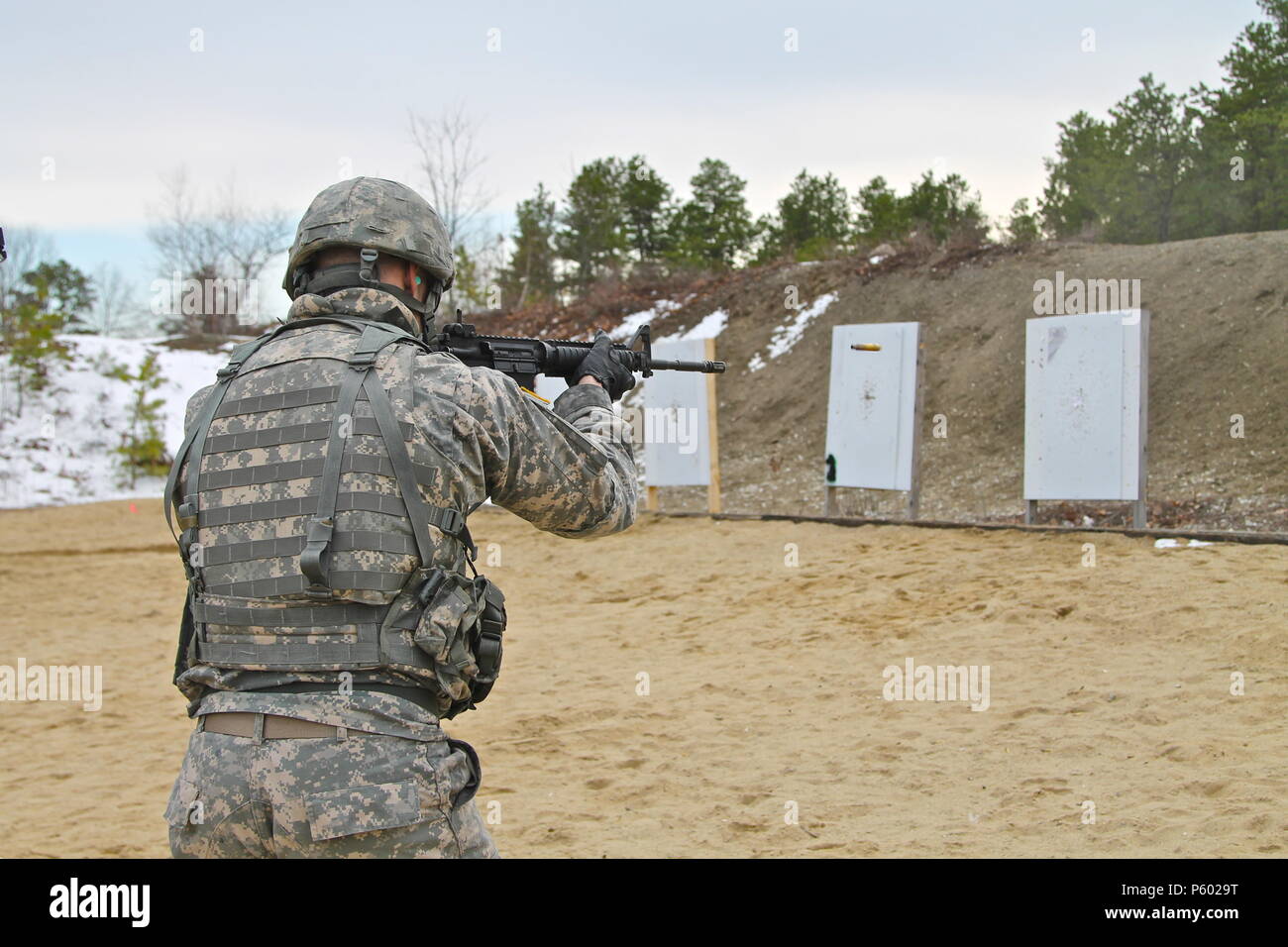 SGT Collin Larmour fires his M4 carbine rifle on the reflexive fire ...