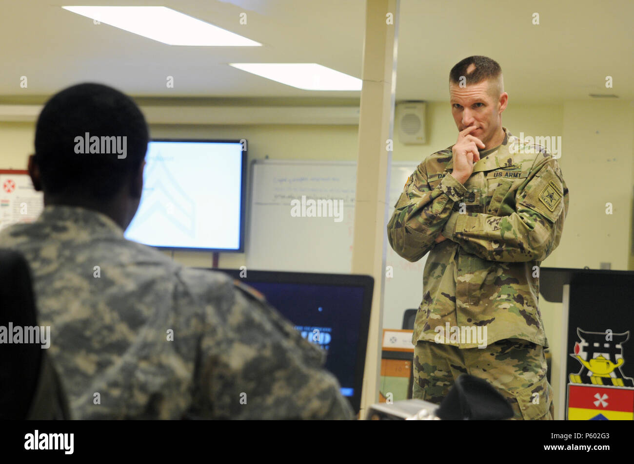 Sergeant Major of the Army Daniel Dailey (right) answers questions from ...