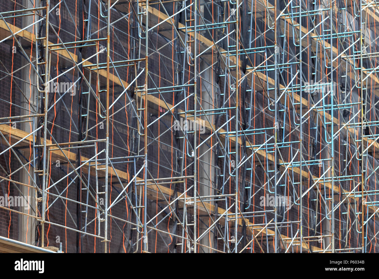Close up of construction scaffolding on a commercial building ...