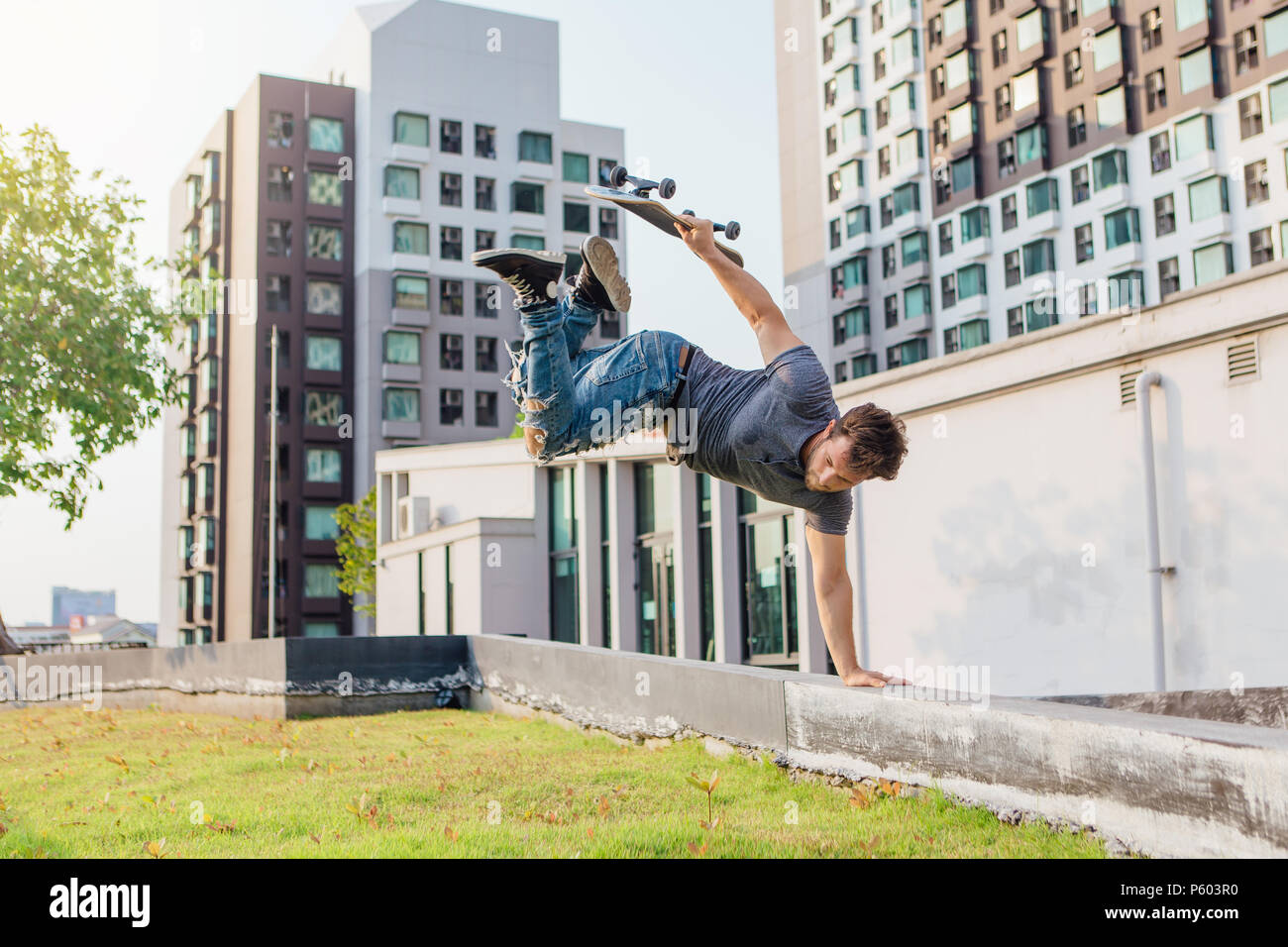 Skateboarder handstand on ramp on the sunset Stock Photo - Alamy