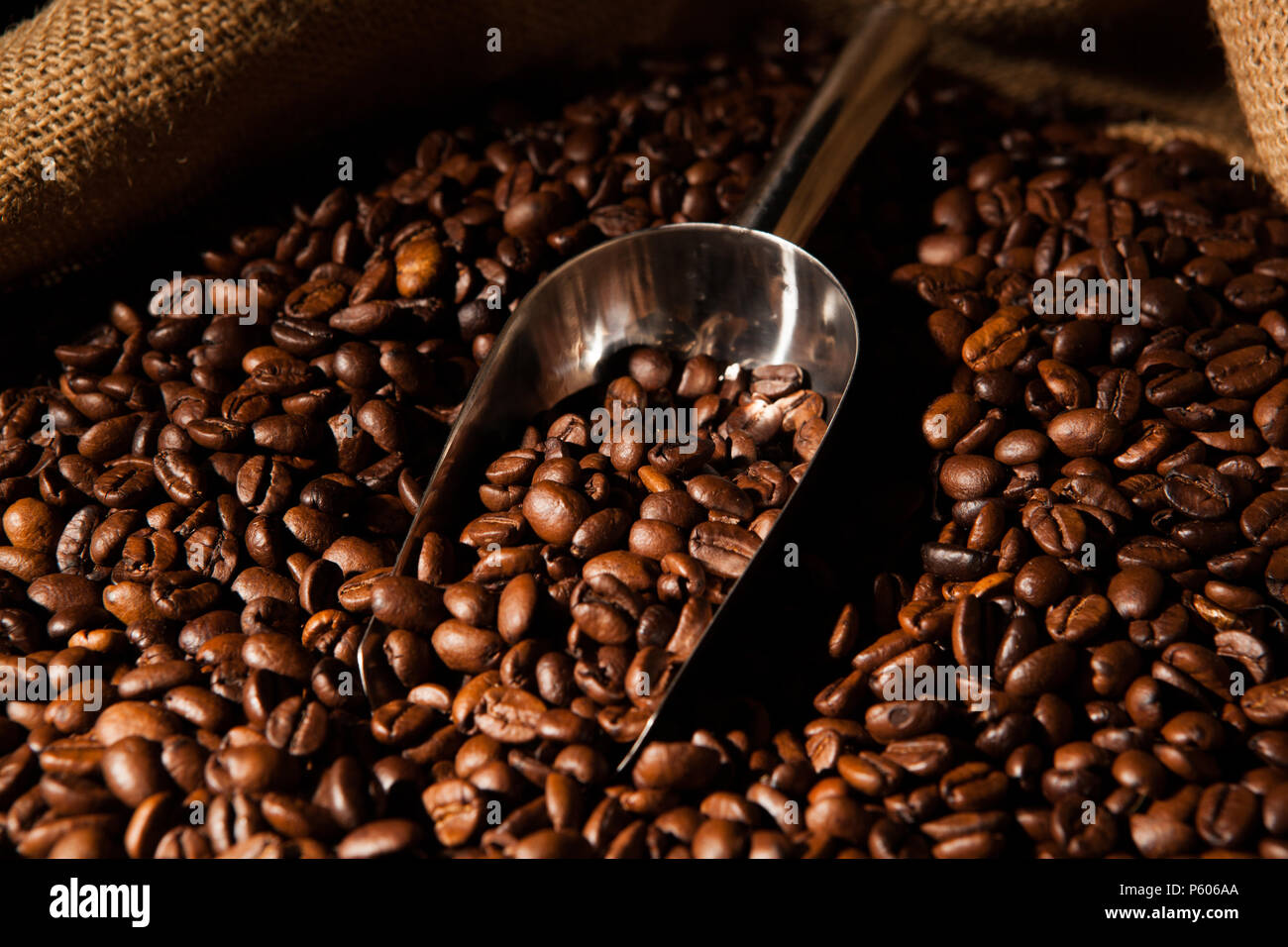 roasted coffee beans with scoop close up Stock Photo - Alamy