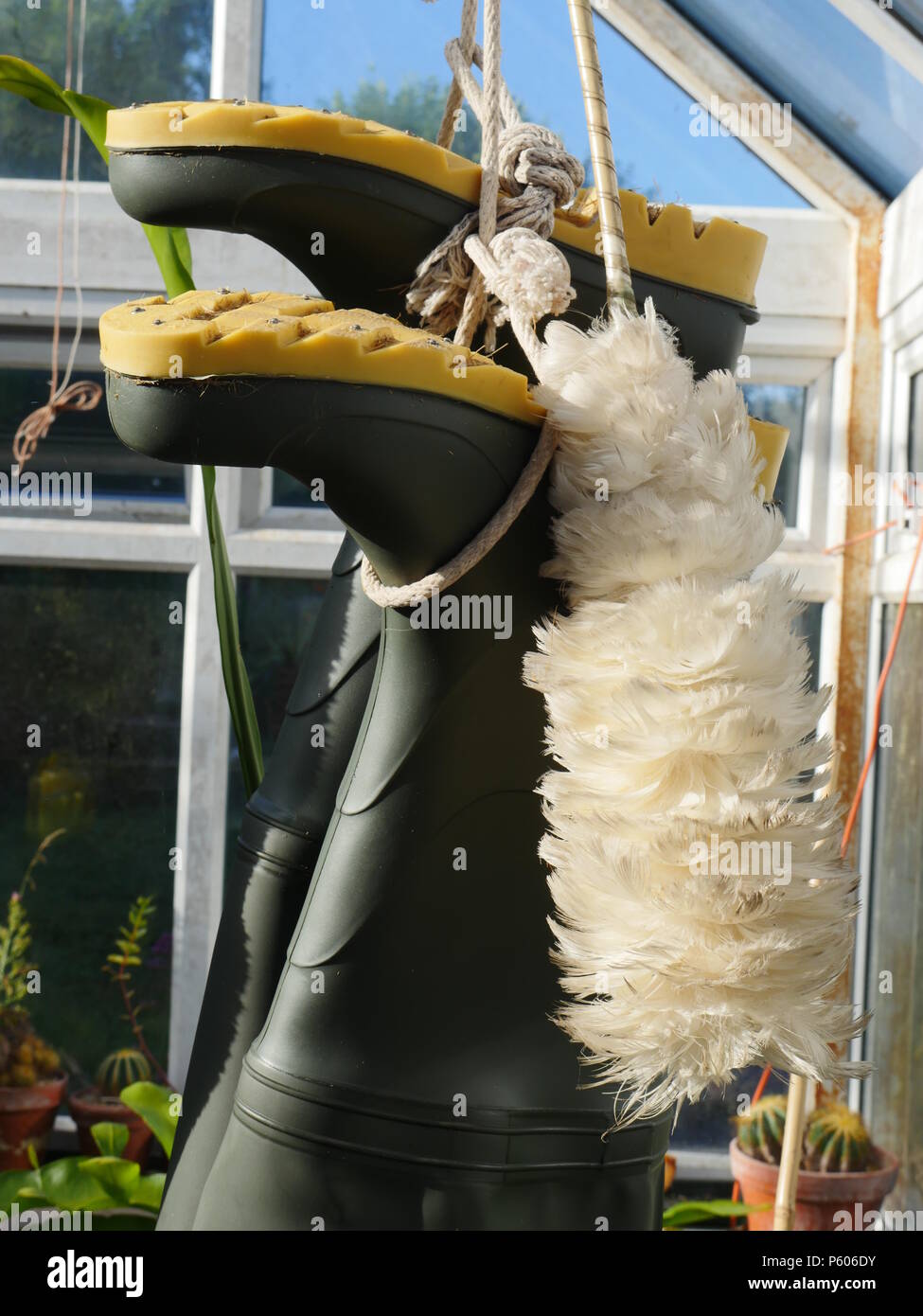 Hanging fishing waders hi-res stock photography and images - Alamy