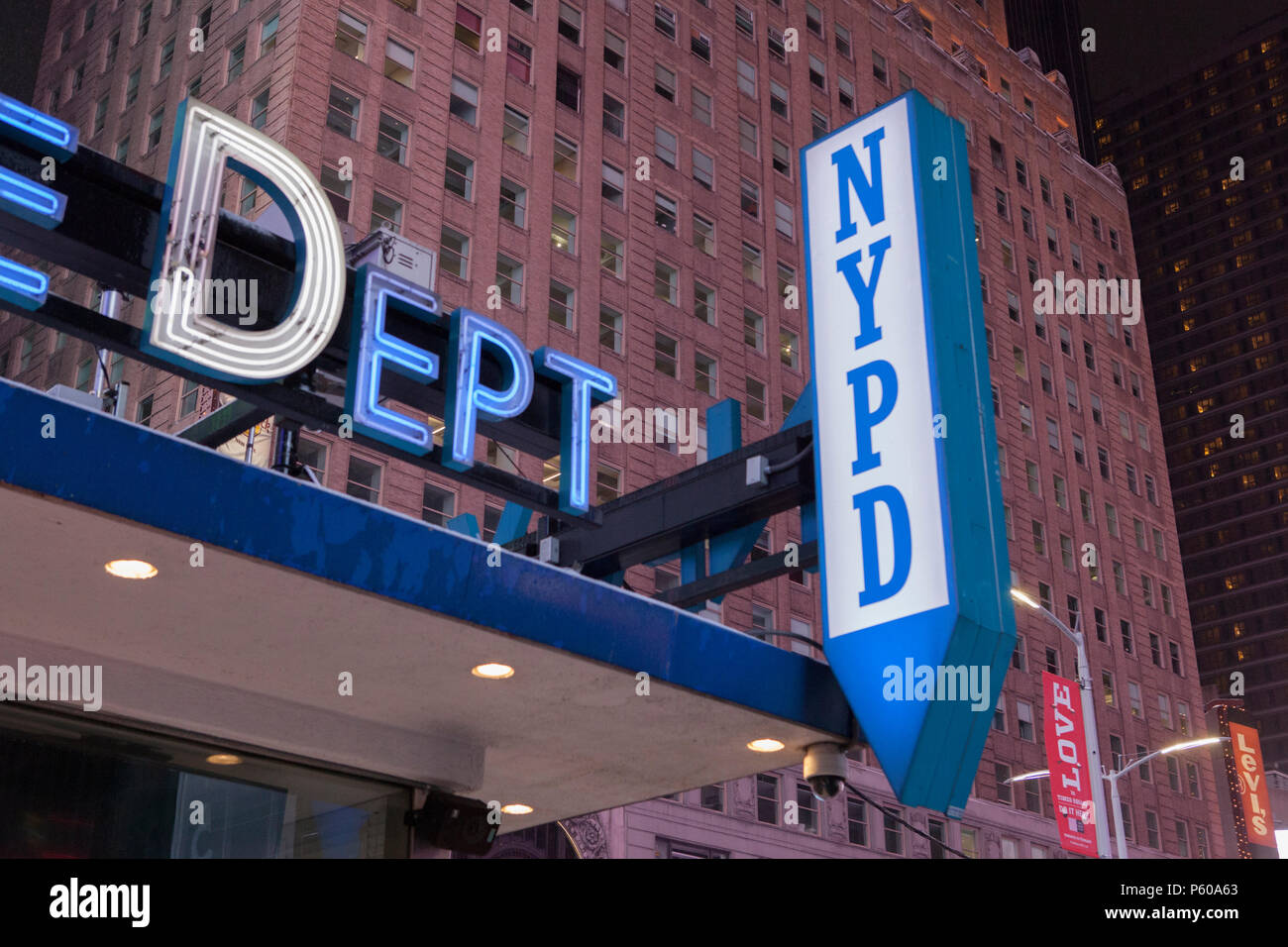 The iconic neon sign of the New York Police Department in Times Square ...