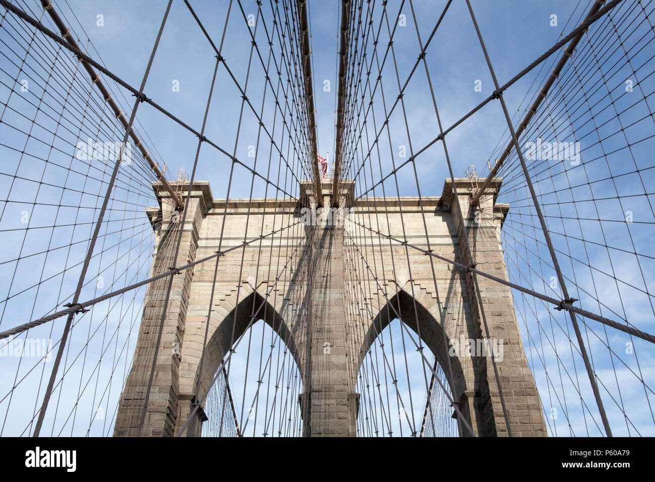 The iconic Brooklyn Bridge in New York crosses the East River Stock ...