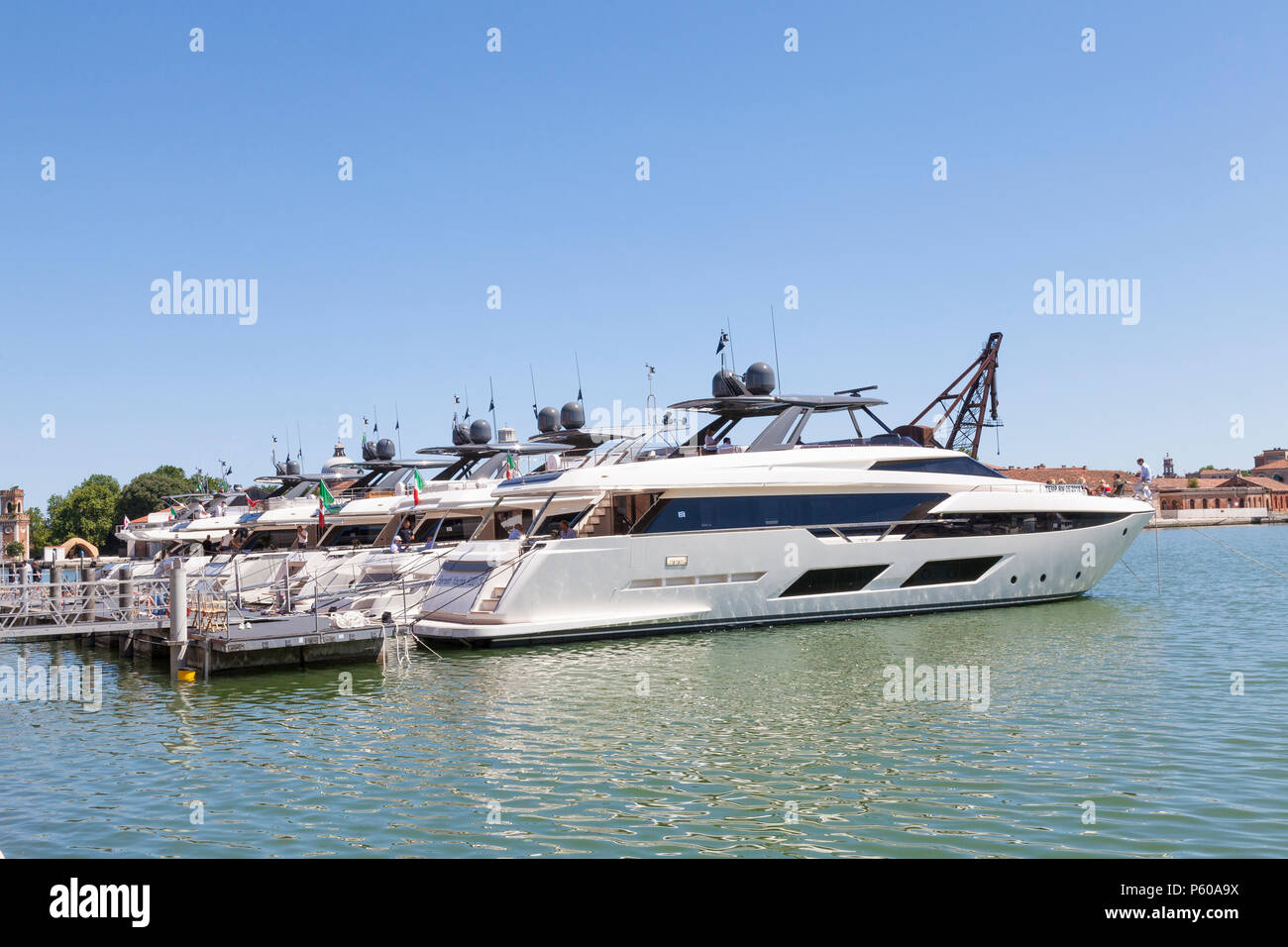 Fleet of Ferretti Yachts on display at Arsenale, Castello, Venice ...