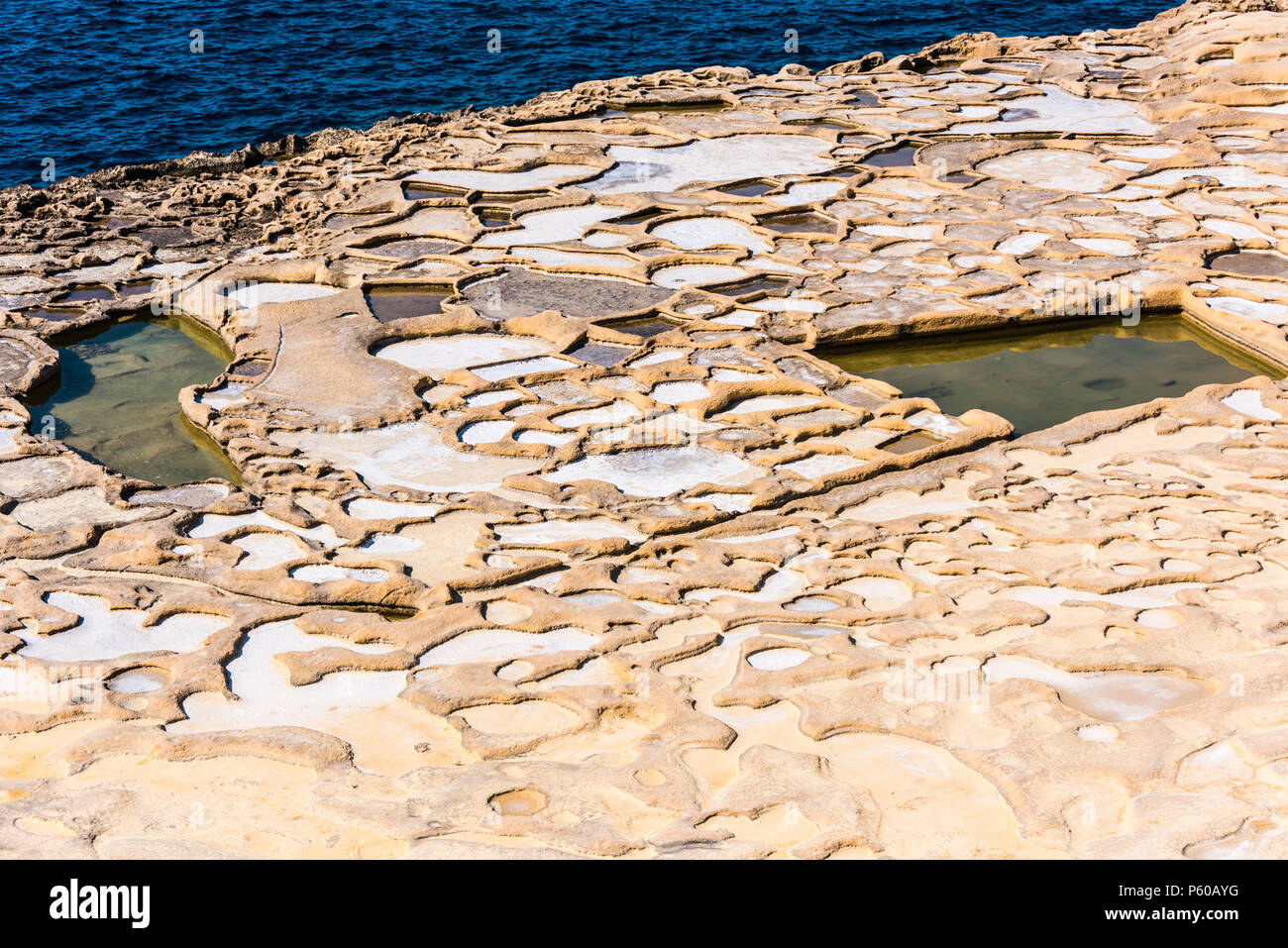 Ancient salt pans in Marsalforn, Gozo, Malta Stock Photo - Alamy
