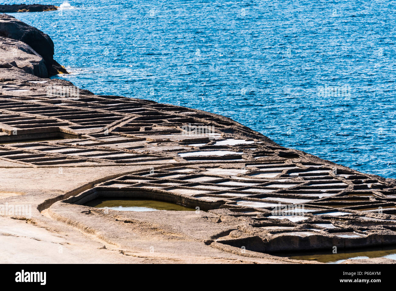 Ancient salt pans in Marsalforn, Gozo, Malta Stock Photo - Alamy