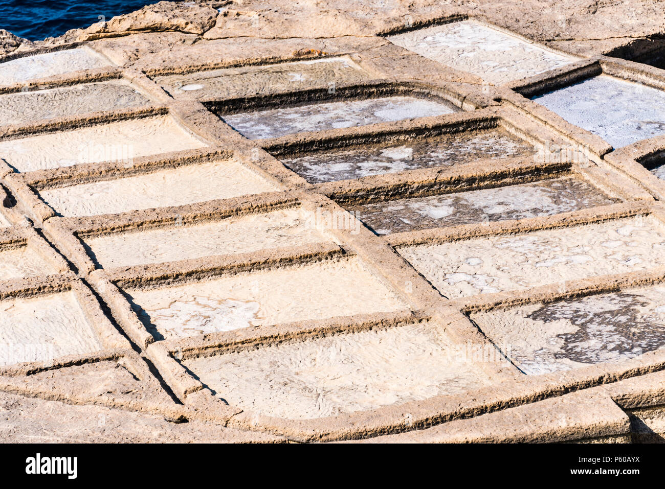 Ancient salt pans in Marsalforn, Gozo, Malta Stock Photo - Alamy