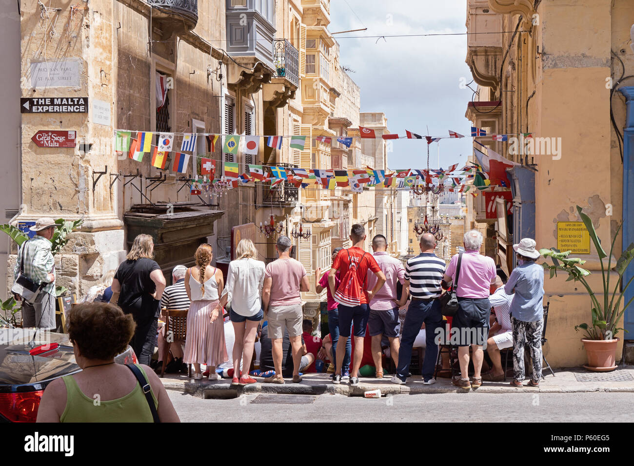 VALLETTA, MALTA - JUNE 24, 2018: Maltese people fans watch football ...