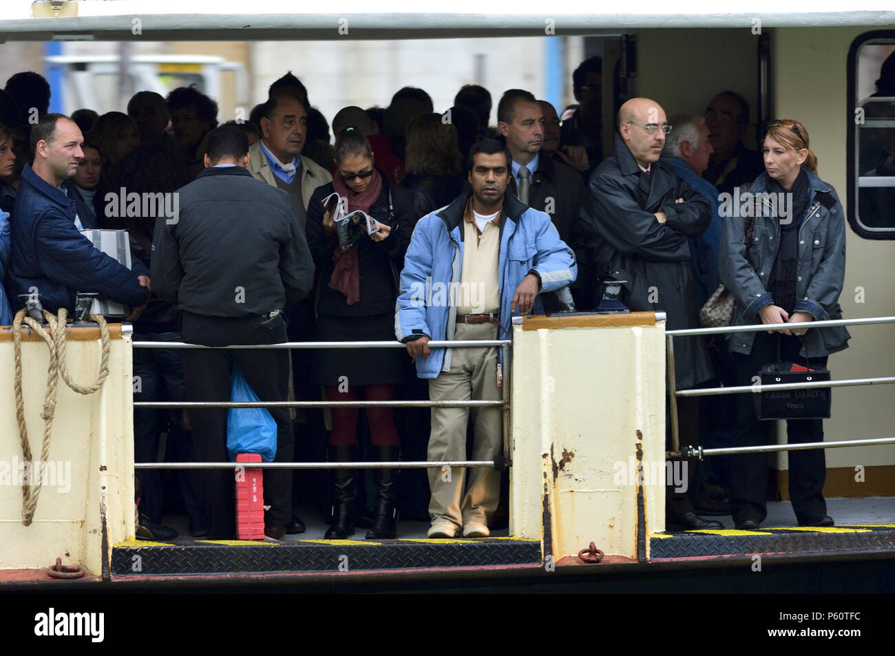 Locals on board a the ACTV Vaporetto waterbus, in Venice, IT, on ...