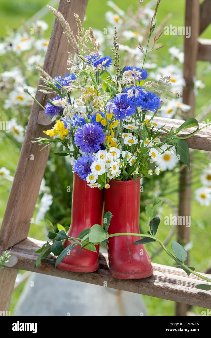 Wellies and flowers hi-res stock photography and images - Alamy
