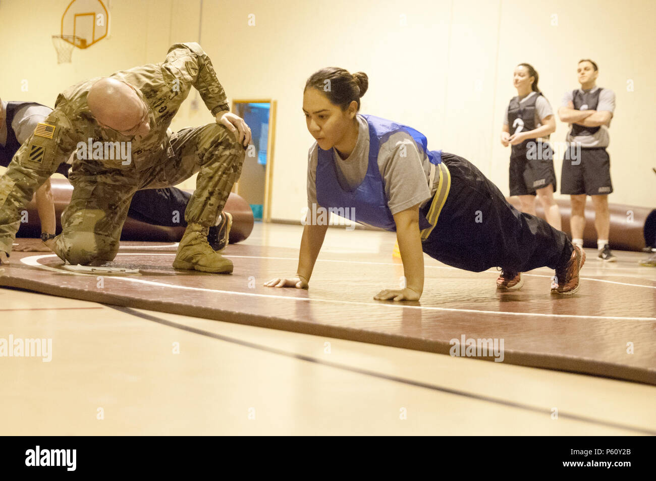 Spc. Ariana Ramirez, from 350th Civil Affairs Command, competes in the ...