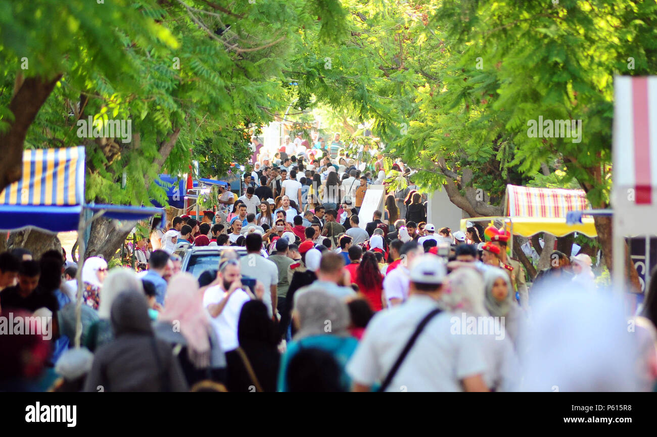 Damascus, Syria. 27th June, 2018. People attend a festival called "The ...
