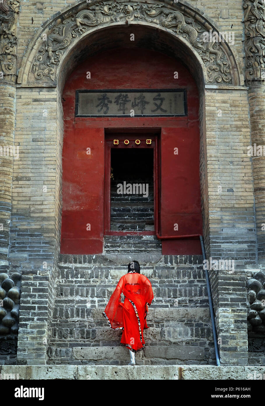Zhengzhou, China's Henan Province. 25th Apr, 2017. A tourist visits the ...