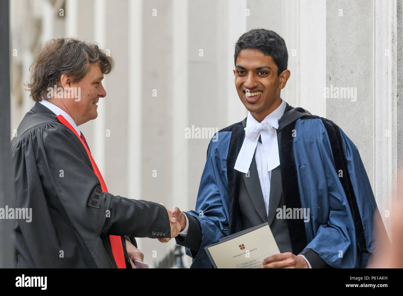 Cambridge University, UK. 28th Jun 2018. A delighted newly qualified ...
