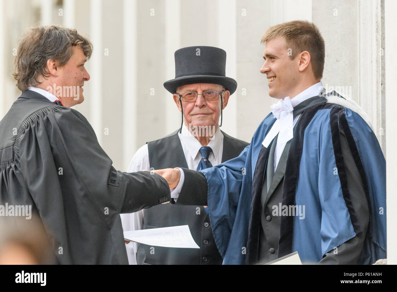 Cambridge University, UK. 28th Jun 2018. A delighted newly qualified ...