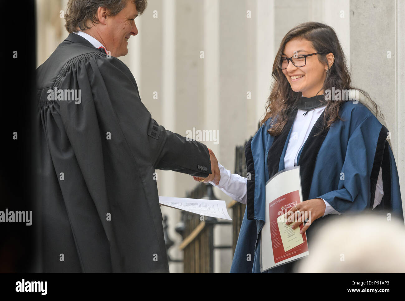 Cambridge University, UK. 28th Jun 2018. A delighted newly qualified ...