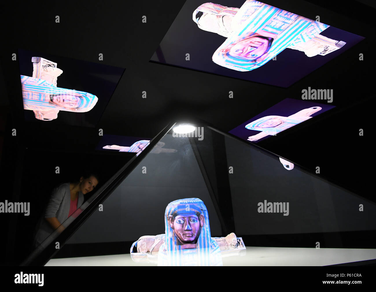 Germany, Hildesheim. 28th June, 2018. An employee looks at the animated ...