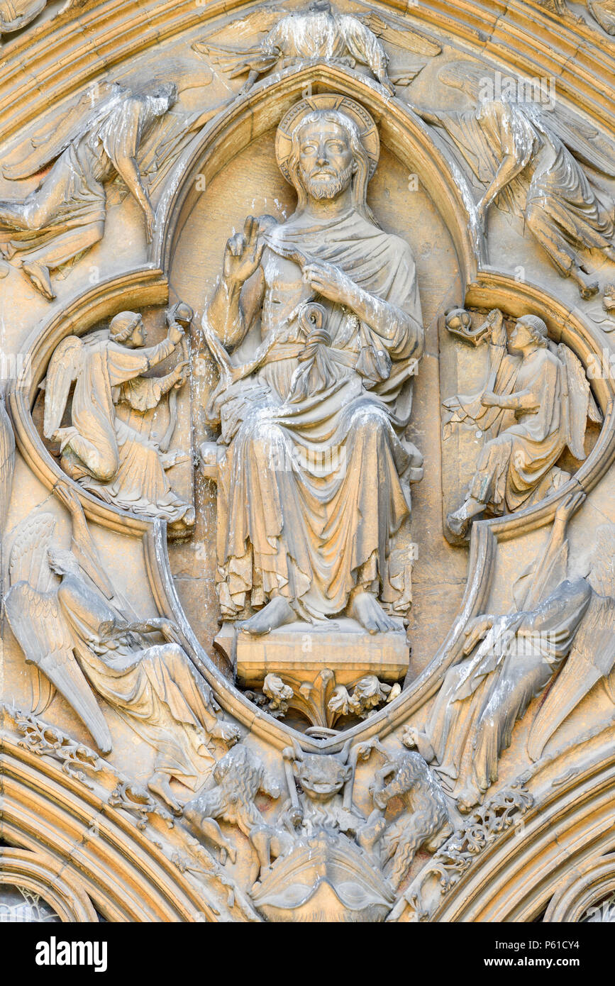 Statue, of the risen Jesus Christ in glory, on an outside wall at the ...