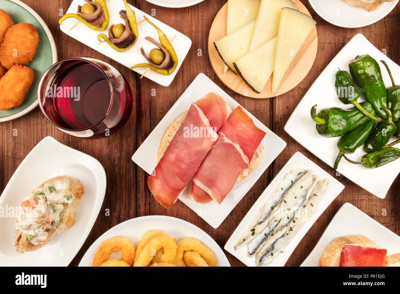 The food of Spain. An overhead closeup photo of various Spanish tapas ...