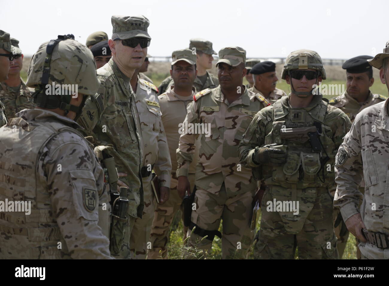 U.S. Army Lt. Gen. Sean MacFarland, left, commander of the Combined ...