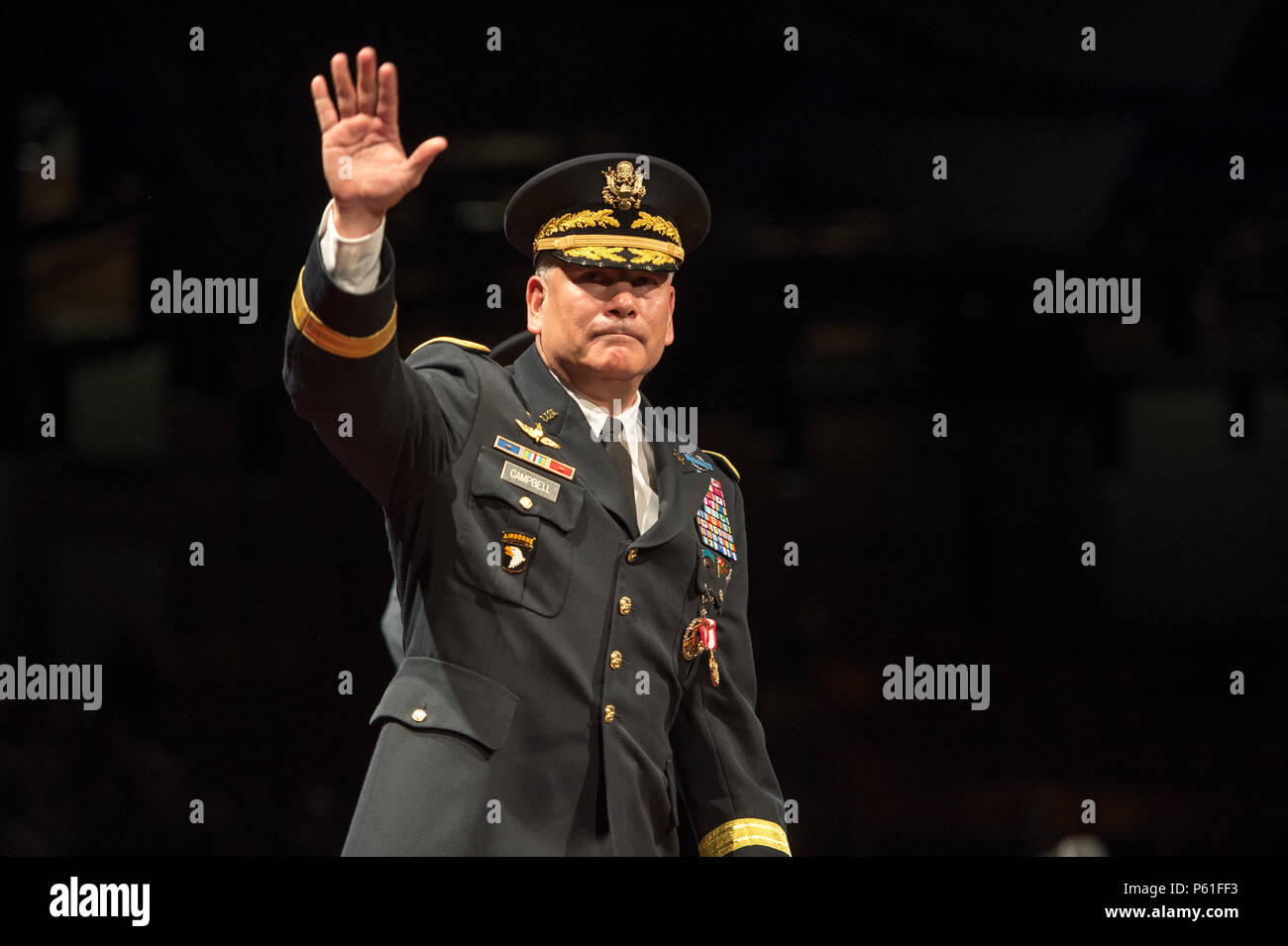 U.S. Army Gen. John F. Campbell waves at the audience during a ...