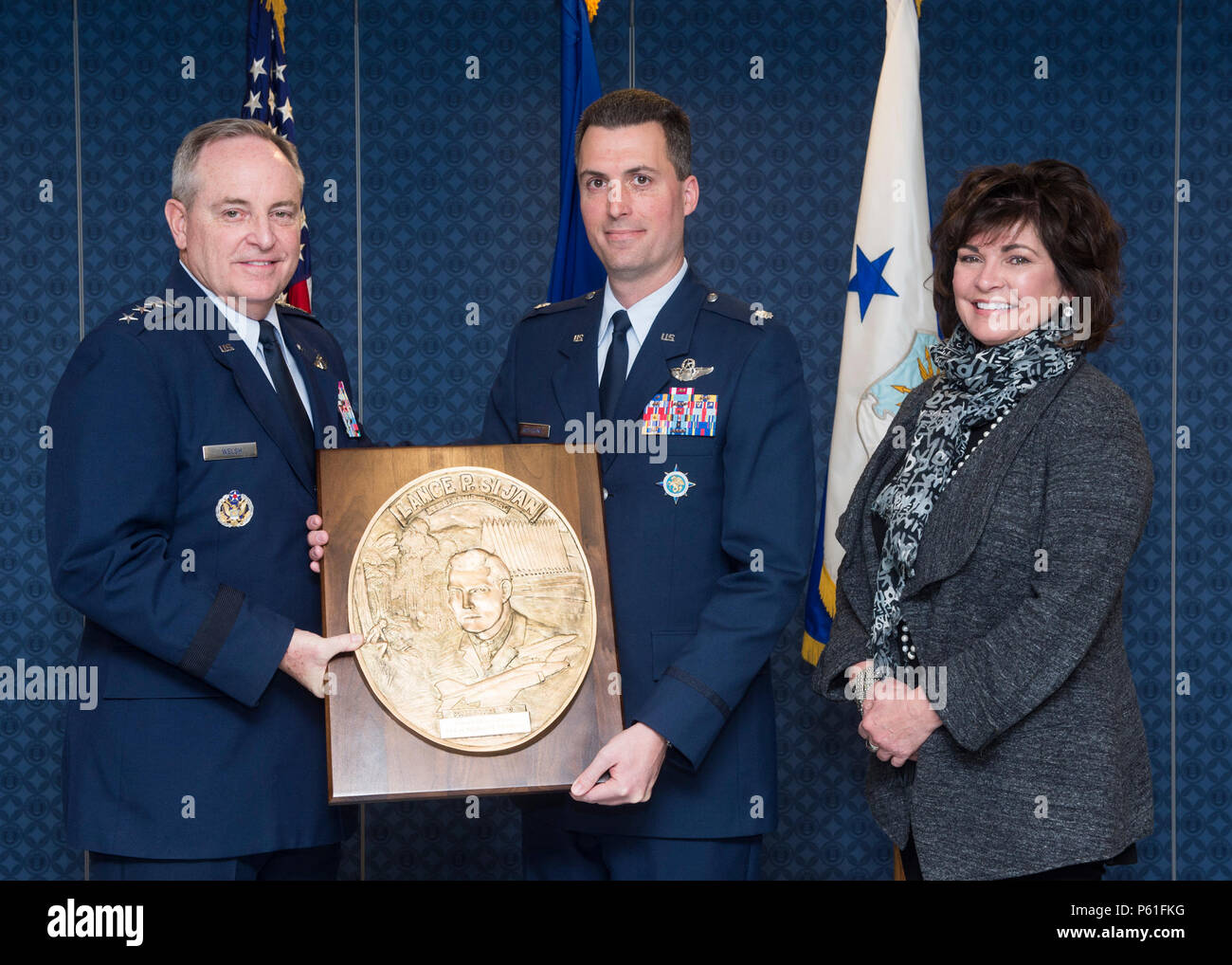 Air Force Chief of Staff Gen. Mark. A Welsh III presents the Lance P. Sijan Leadership award to ...
