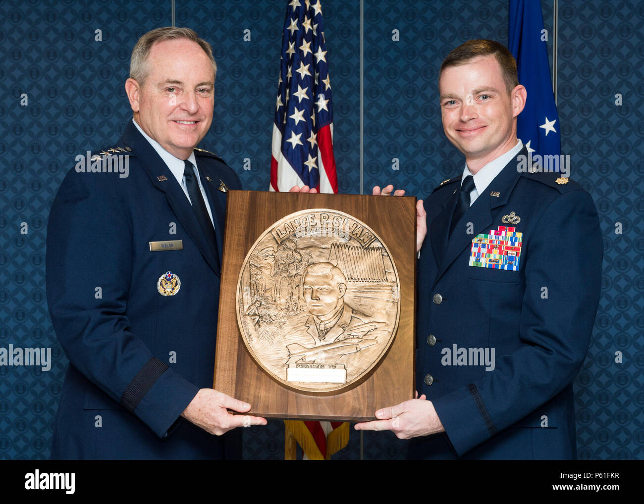 Air Force Chief of Staff Gen. Mark. A Welsh III presents the Lance P ...