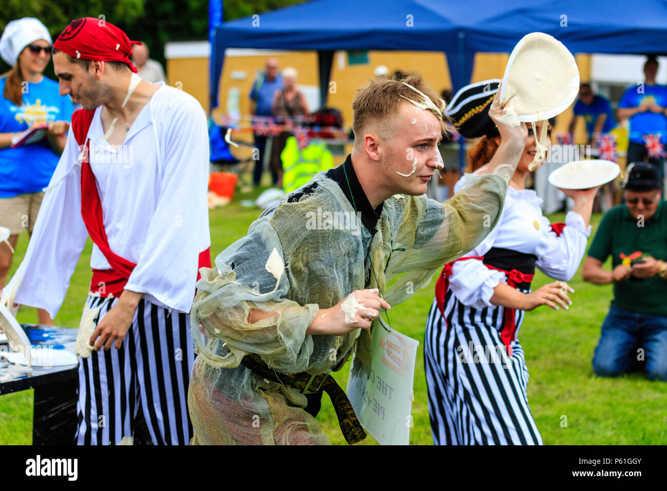 Man from The Custard Pie Rates Team throwing custard pie during the ...