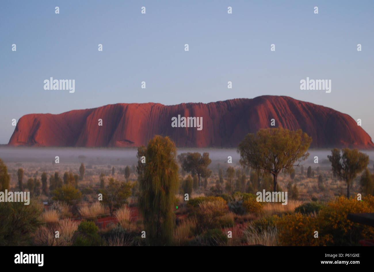 Red uluru and cloud hi-res stock photography and images - Alamy