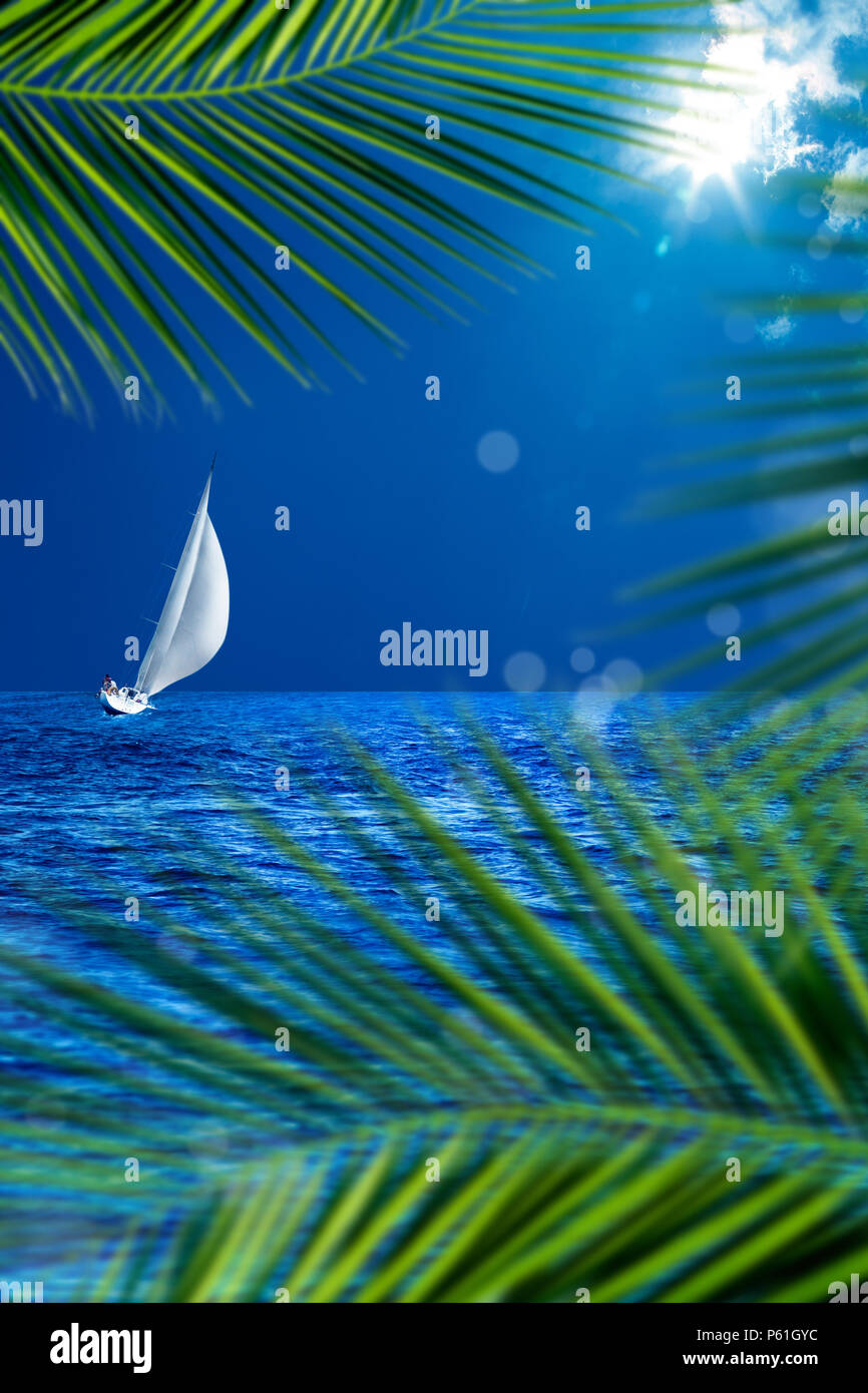 seascape image of sailing boat on sea over sunny sky Stock Photo - Alamy