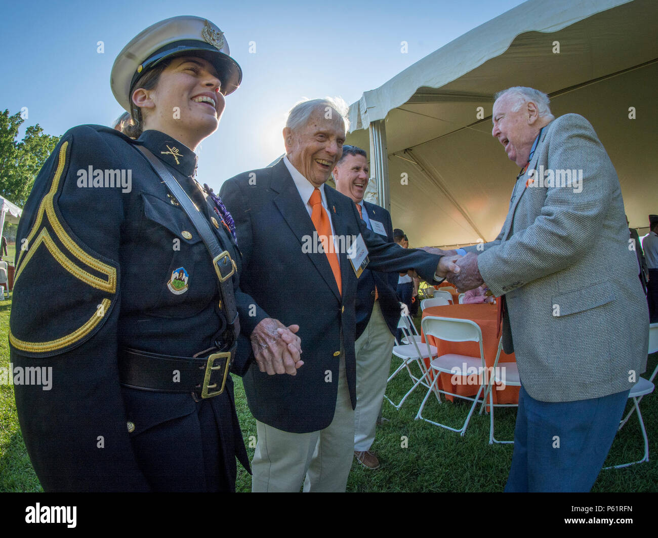 Retired U.S. Army Col. Ben Skardon (center) shares a laugh with Clemson ...