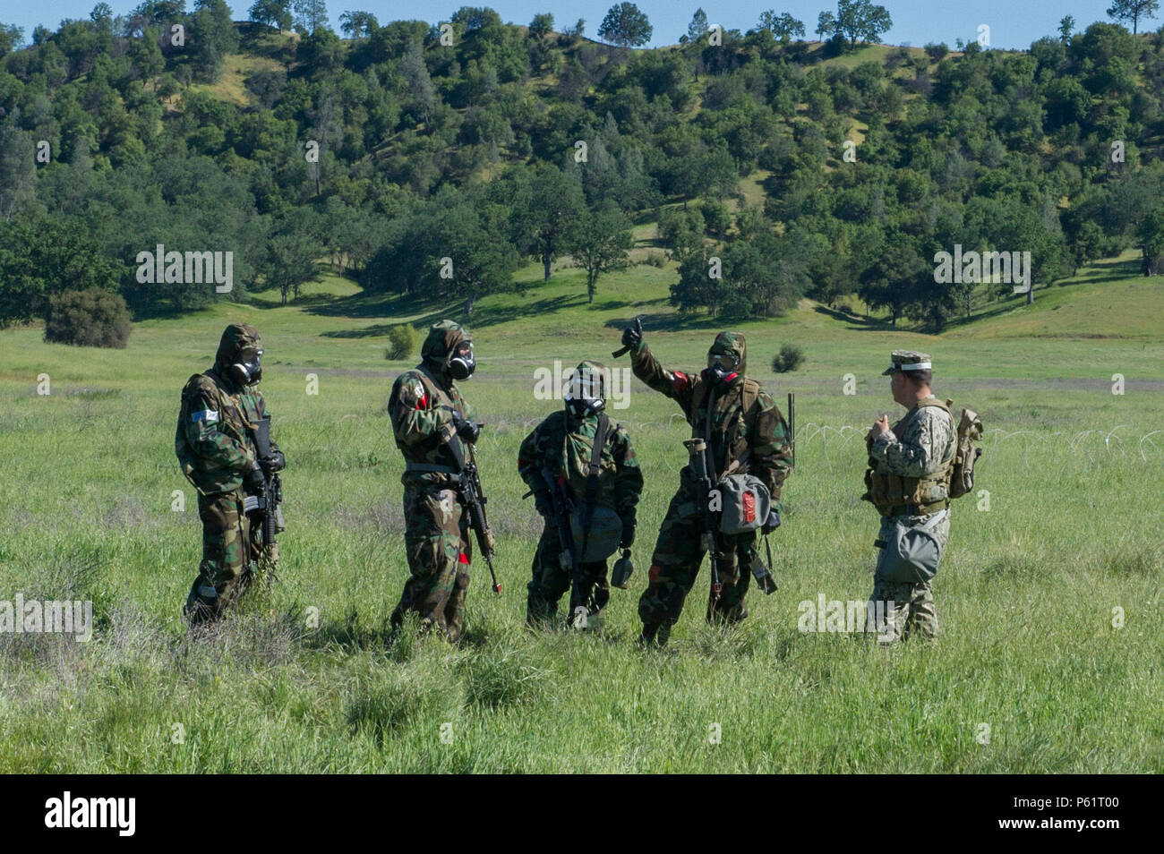 A Seabee assigned to Naval Mobile Construction Battalion 5 signals ...