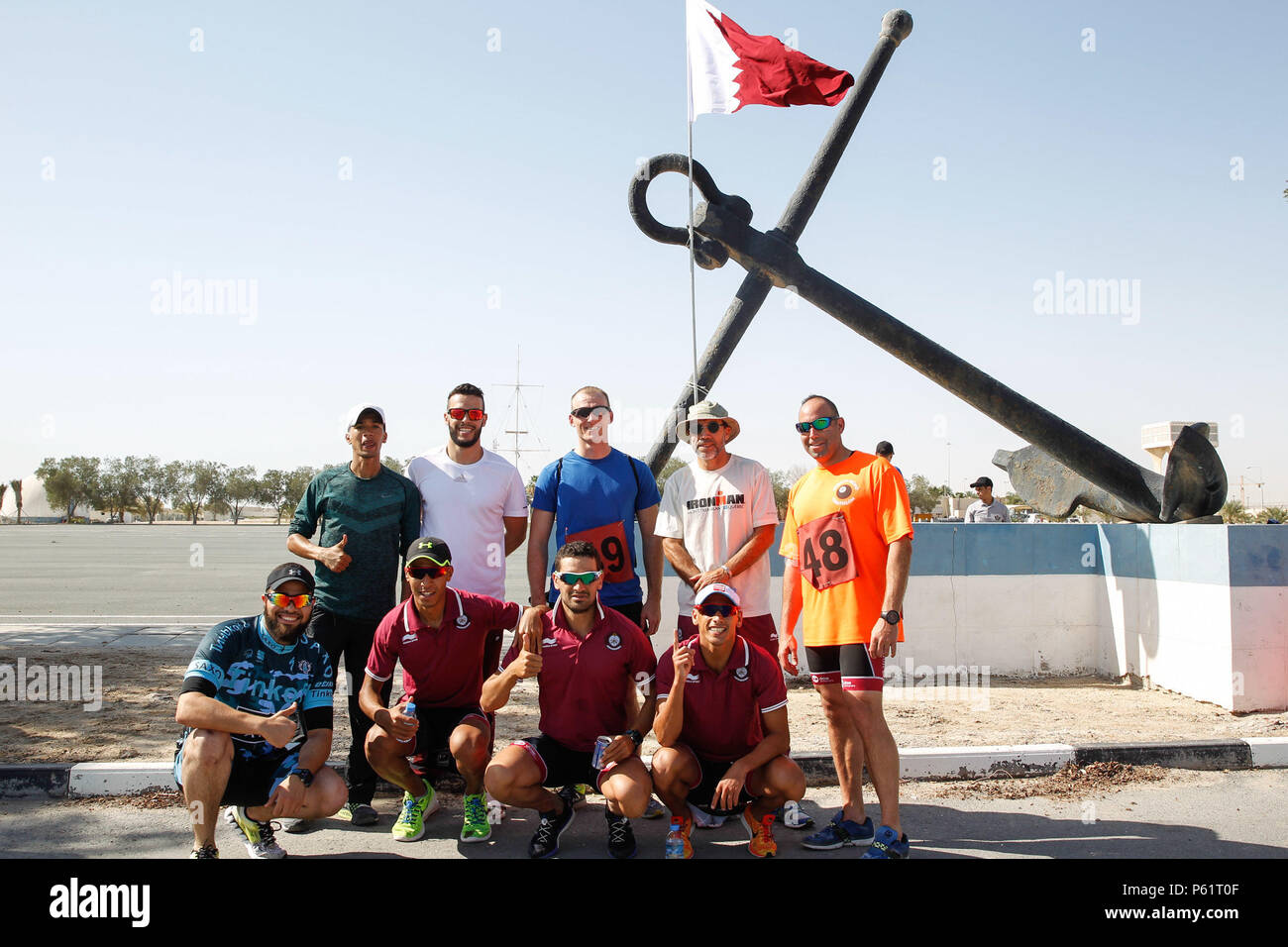1Lt. Steven Rusnak Standing with his fellow competitors at the Qatar ...