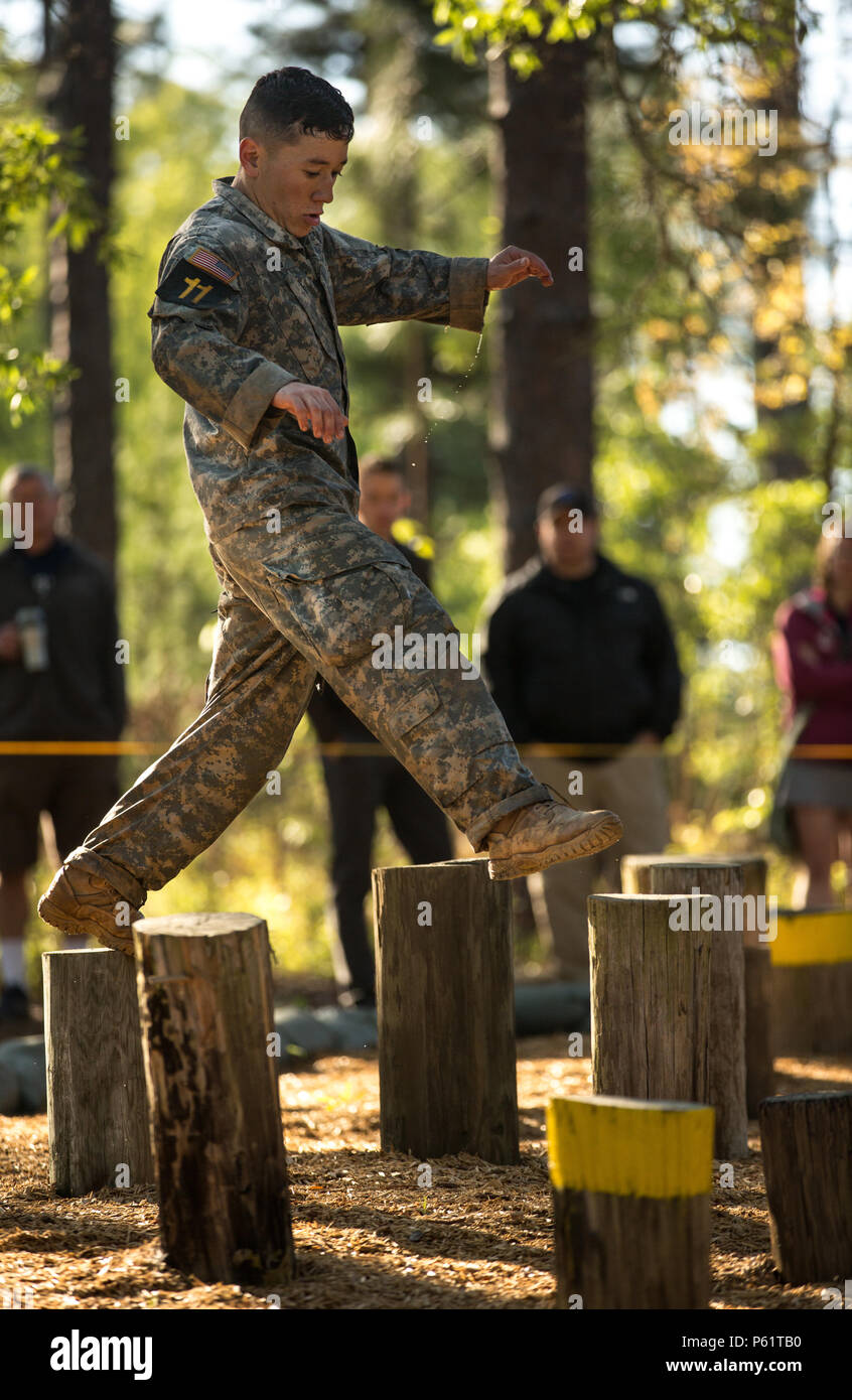 Navigates through an obstacle on the darby queen obstacle course hi-res ...